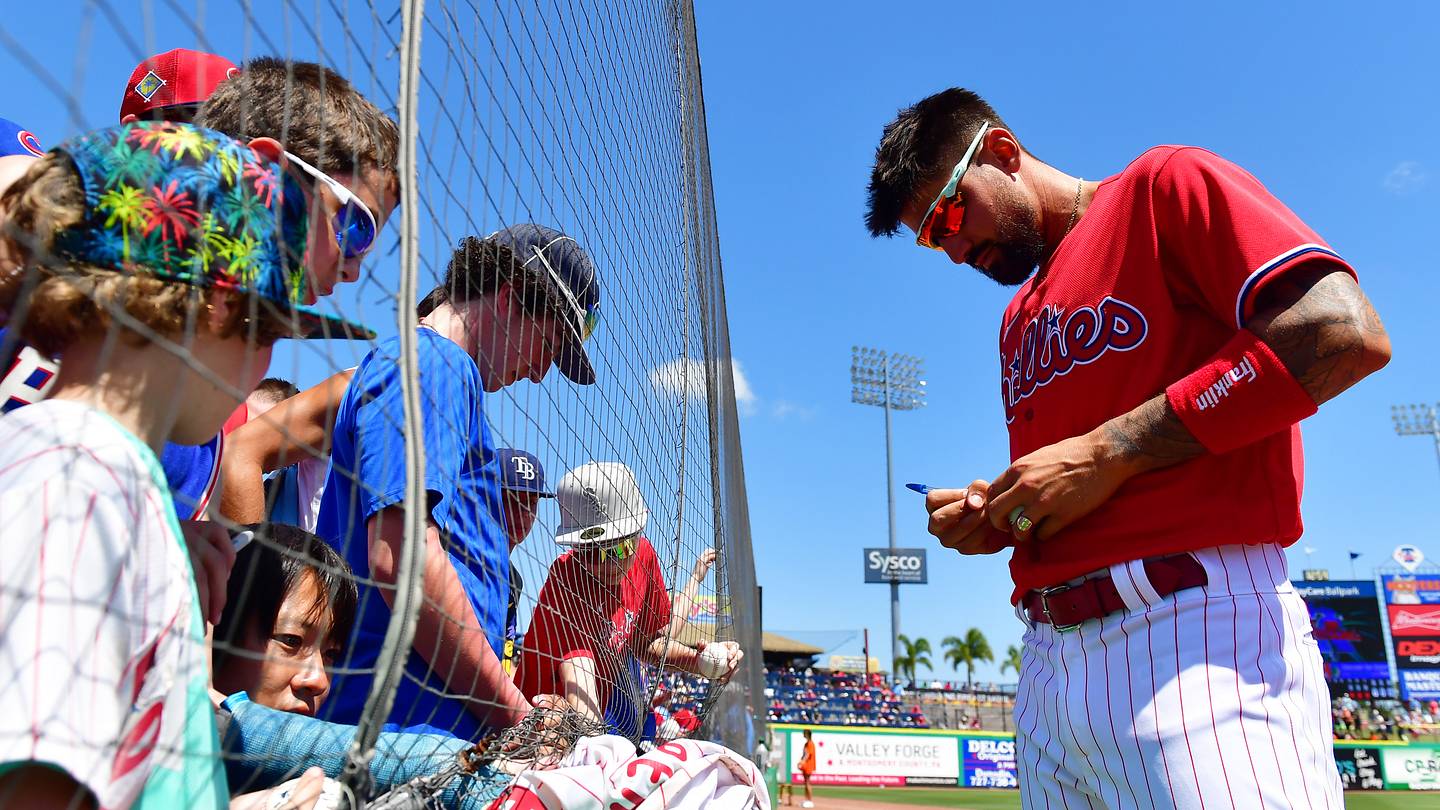 When do the Phillies start their 2025 spring training schedule?