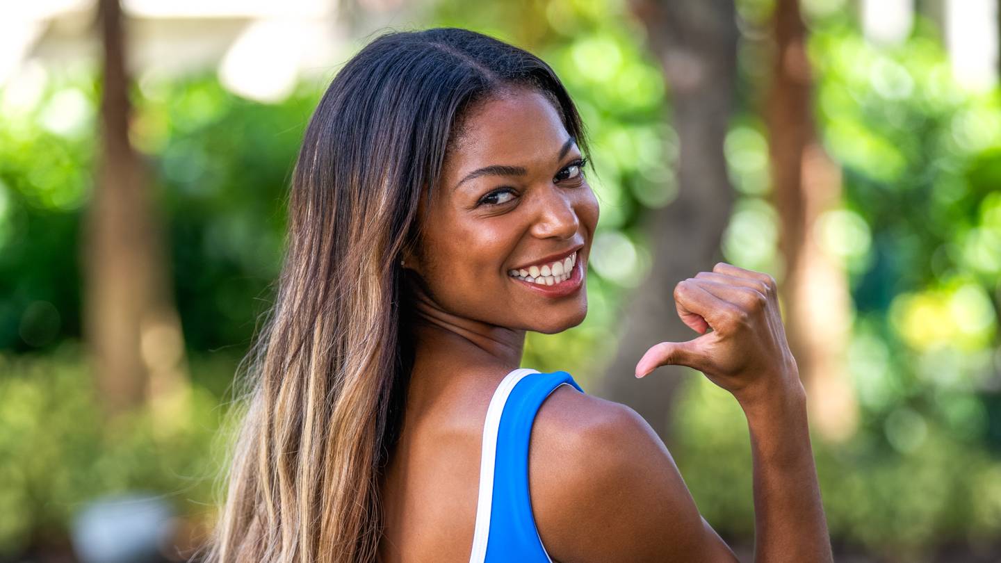 Gabby Thomas Stuns in Blue One-Piece for SI Swimsuit Debut, Encourages ...