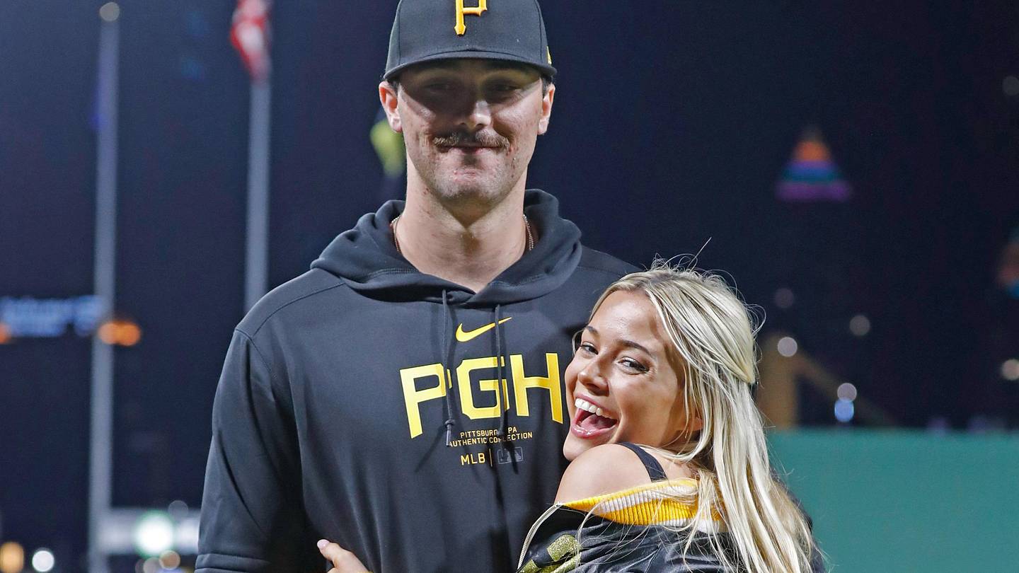 Livvy Dunne slays Chiefs-red top at Super Bowl 2025 with Paul Skenes