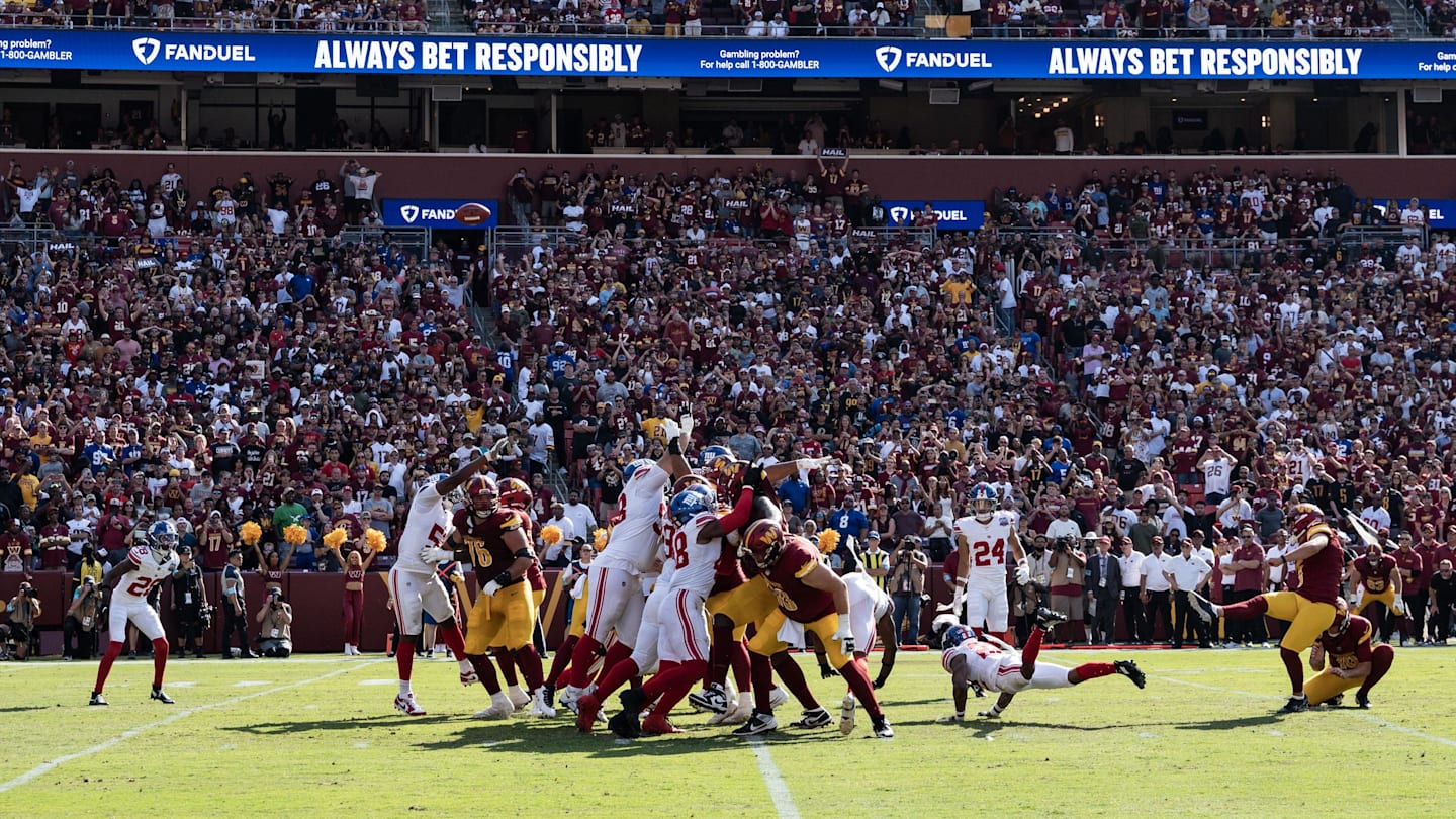 Washington Tops Giants, 27-22