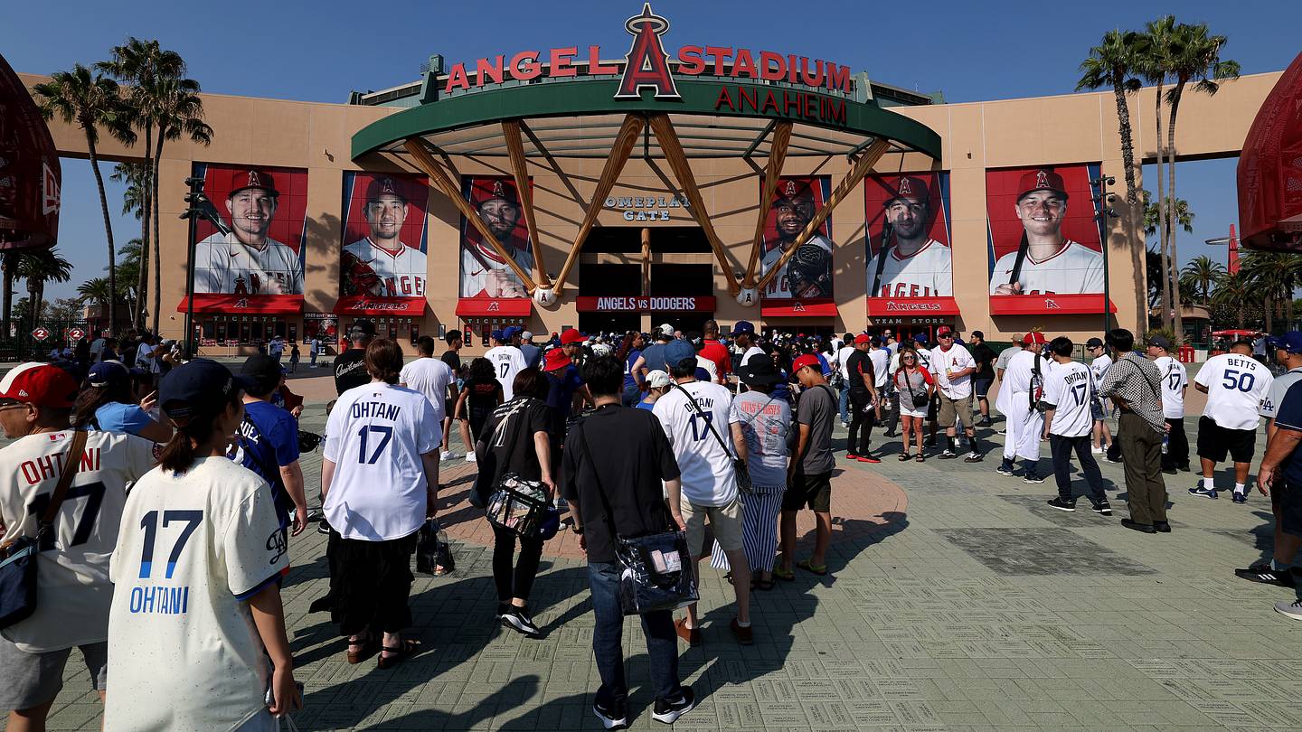 Angels fans shaking their heads in disgust after Dodgers fan brawl ...