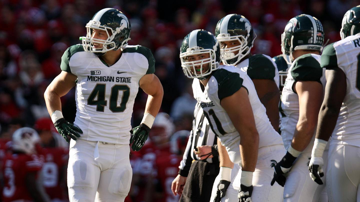 Former Michigan State football players overwhelmingly support hire of ...