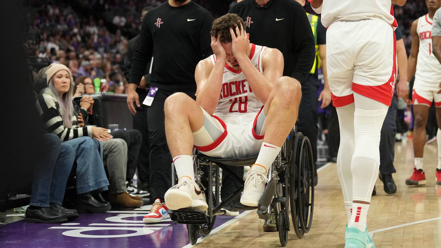 Young star dubbed 'Baby Jokic' leaves game in wheelchair after scary ...