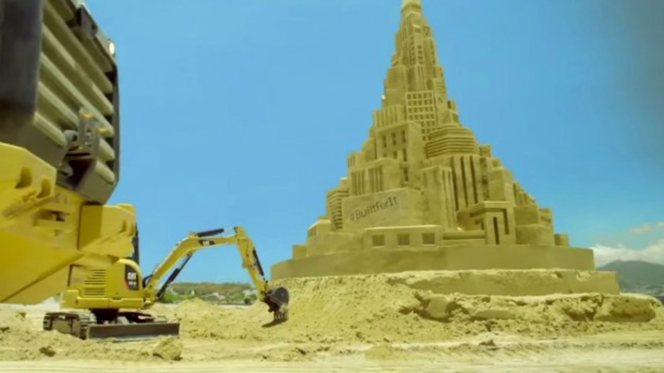 Watch the World's Tallest Sand Castle Get Built to an Insane Height ...