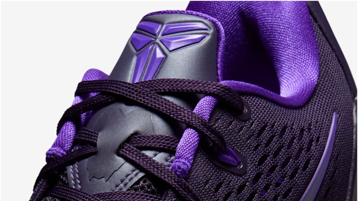 purple nike logo shoes