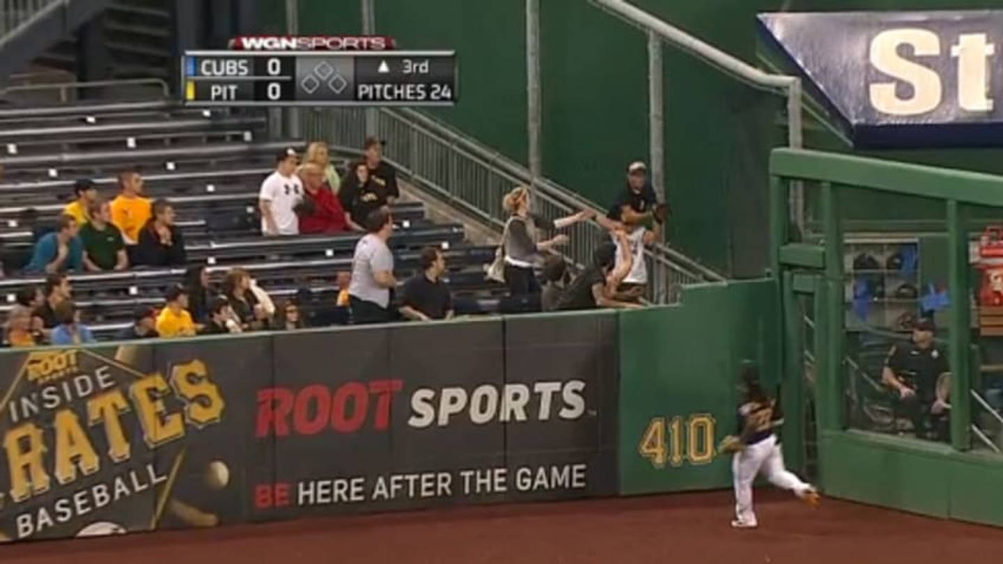 Pirates fan runs over kid to get ball (Video)