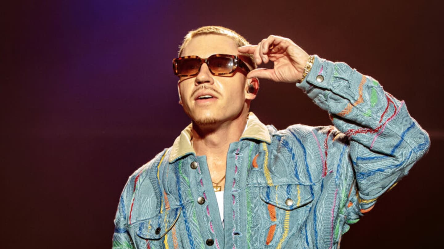 Iconic rapper pictured wearing Celtic jersey on stage