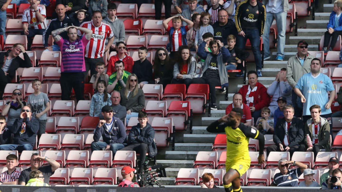 Two Newcastle United fans invade the Stadium of Light