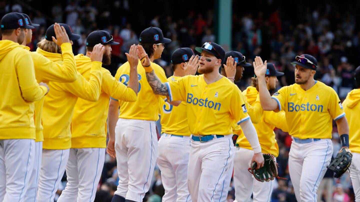 Why are the Boston Red Sox wearing yellow jerseys?