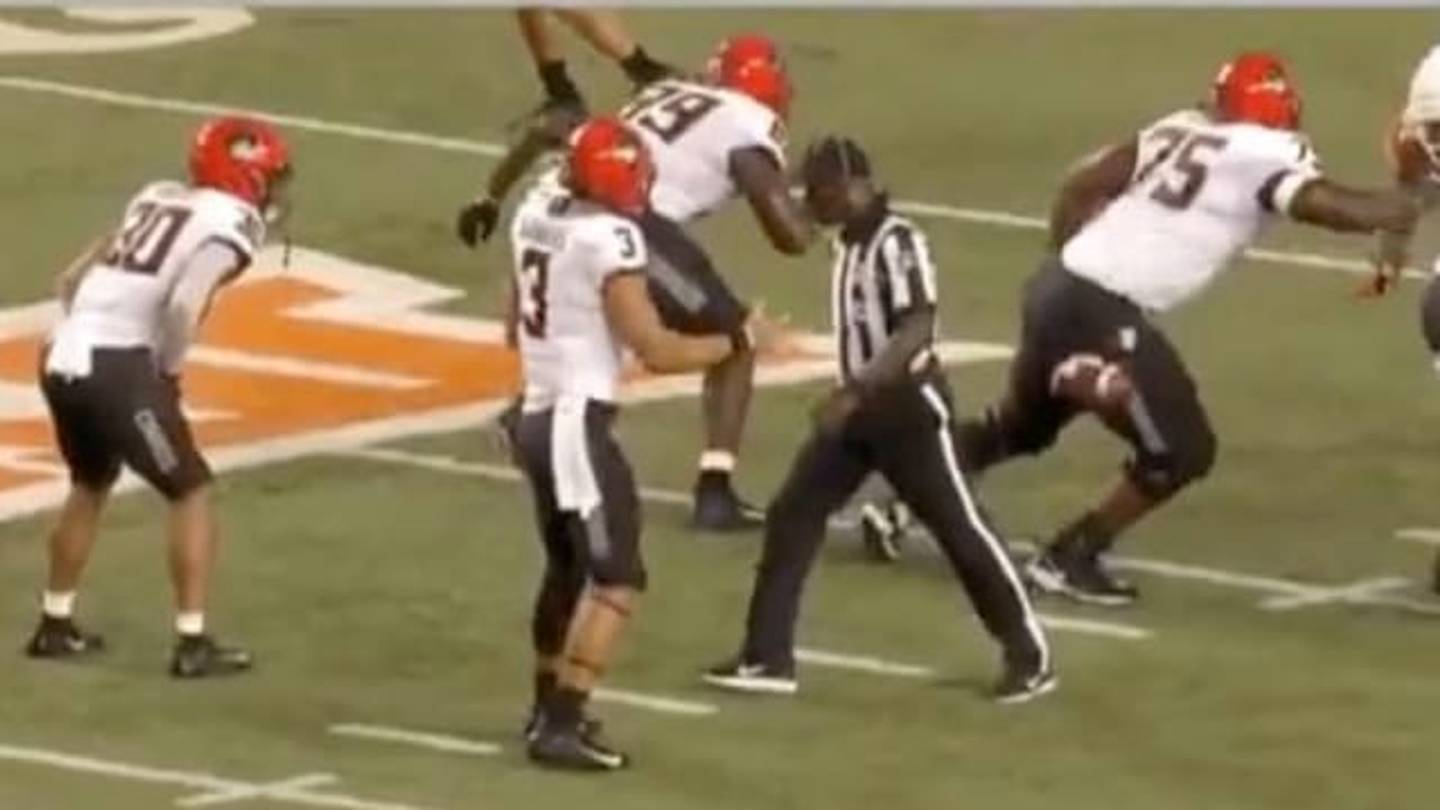 VIDEO: Referee Gets Hit by Oklahoma State's Snap After Standing ...
