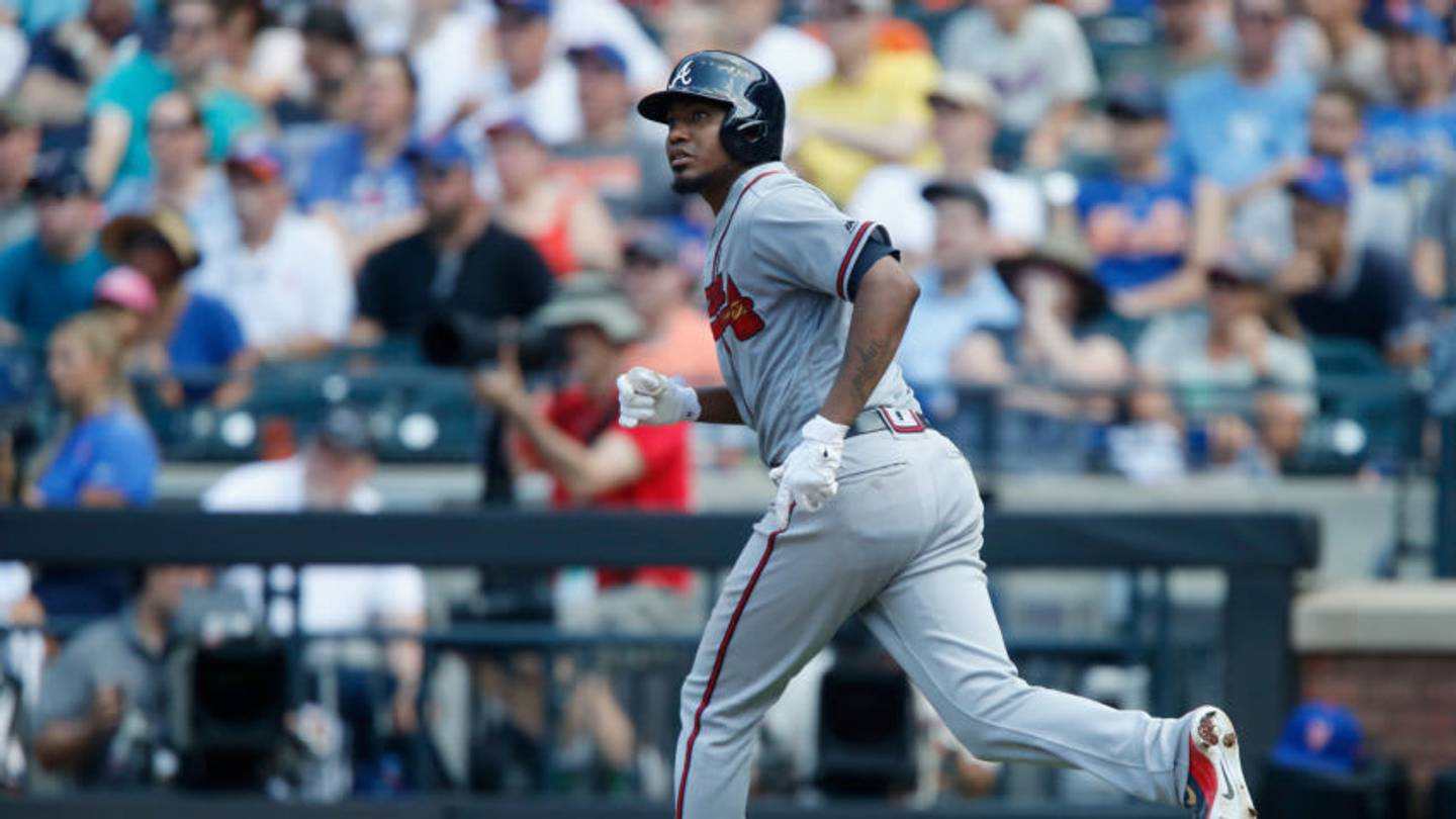 Atlanta Braves eke out an extra inning win and keep pace in East