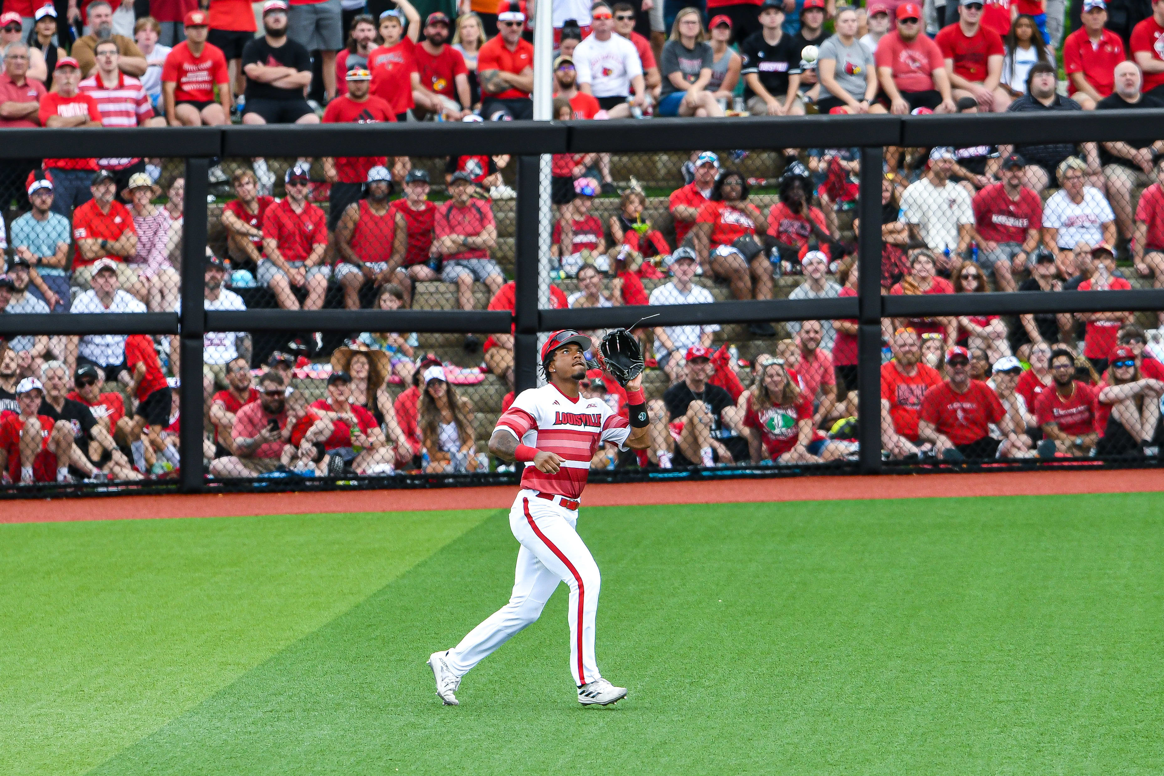 Gallery: Louisville Downs Miami in Super Regional to Reach College ...