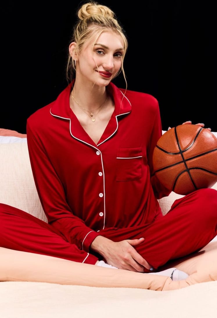 Cameron Brink wows in fire-red pajamas for cozy bed pose