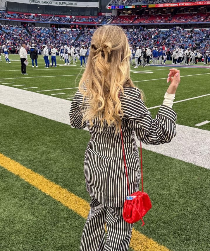 Brittany Mahomes' striped fit channels Beetlejuice in Chiefs loss to Bills