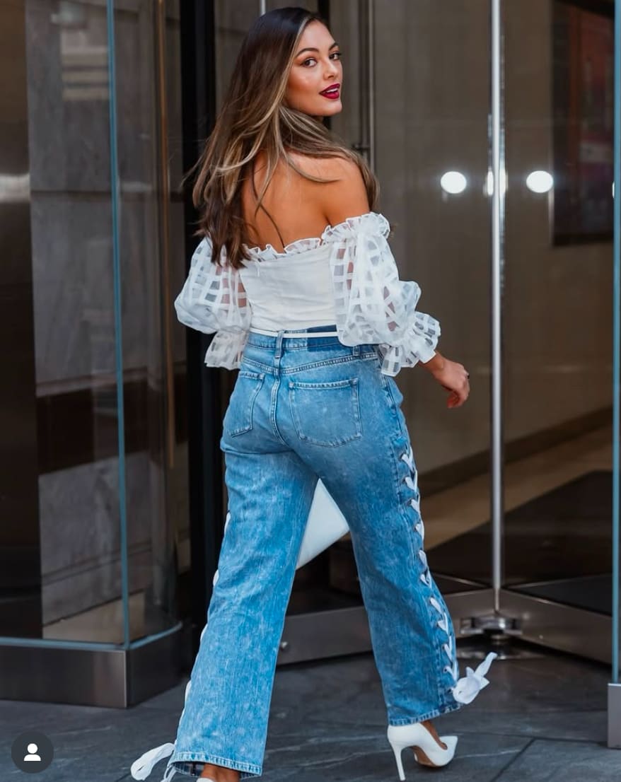 Tim Tebow’s Miss Universe wife crushes fire-red fit for Heisman Trophy ...