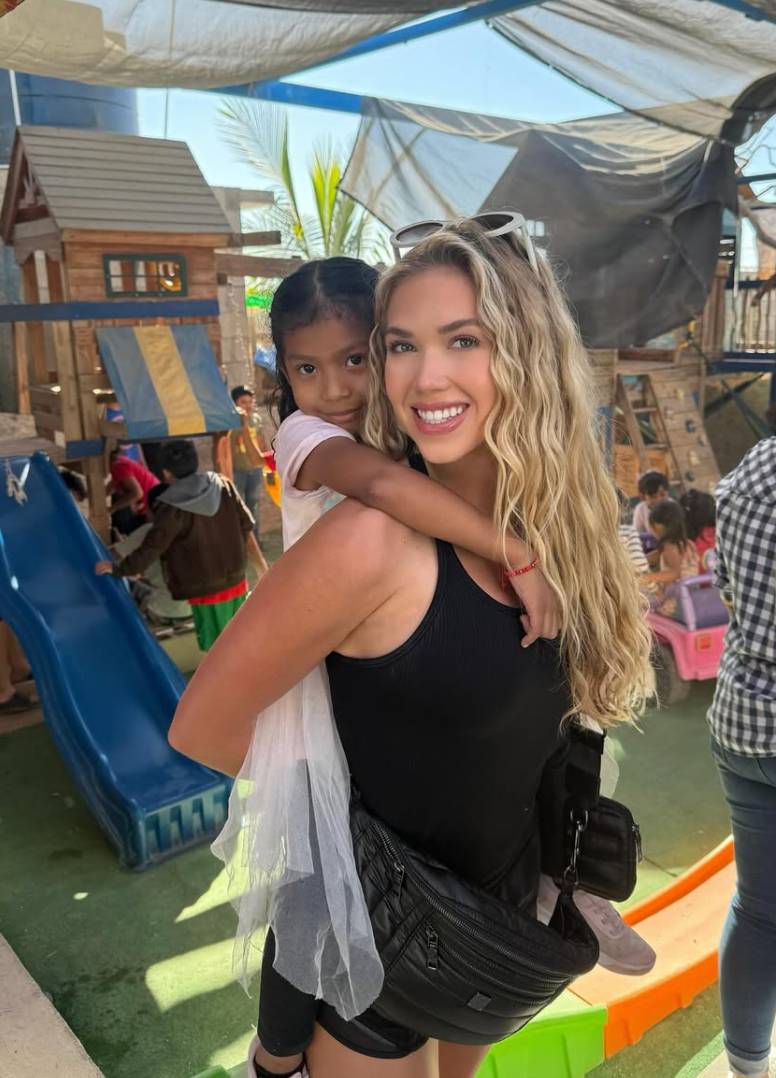 Gracie Hunt flexes loud rainbow dress on vacation as Chiefs freeze en ...