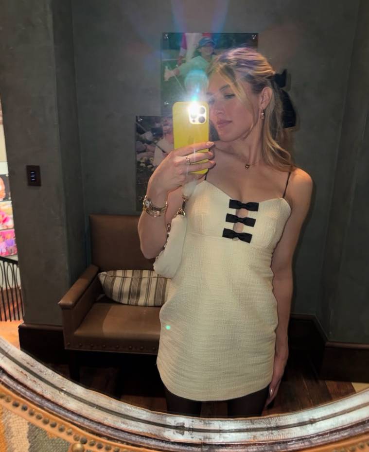 Genie Bouchard flaunts white strapless minidress at Yellowstone ski slopes