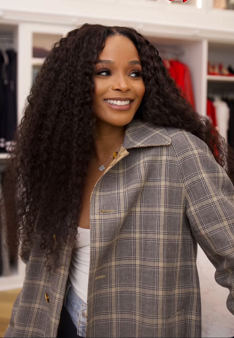 Steve Sarkisian’s wife Loreal teases Texas CFP stunner in full-length plaid coat