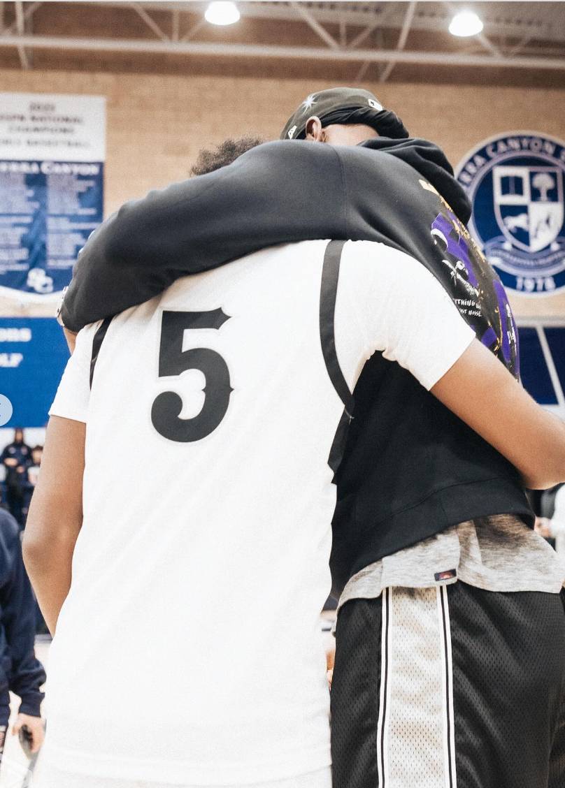 Savannah James gives son Bryce heartwarming hug in final high school season