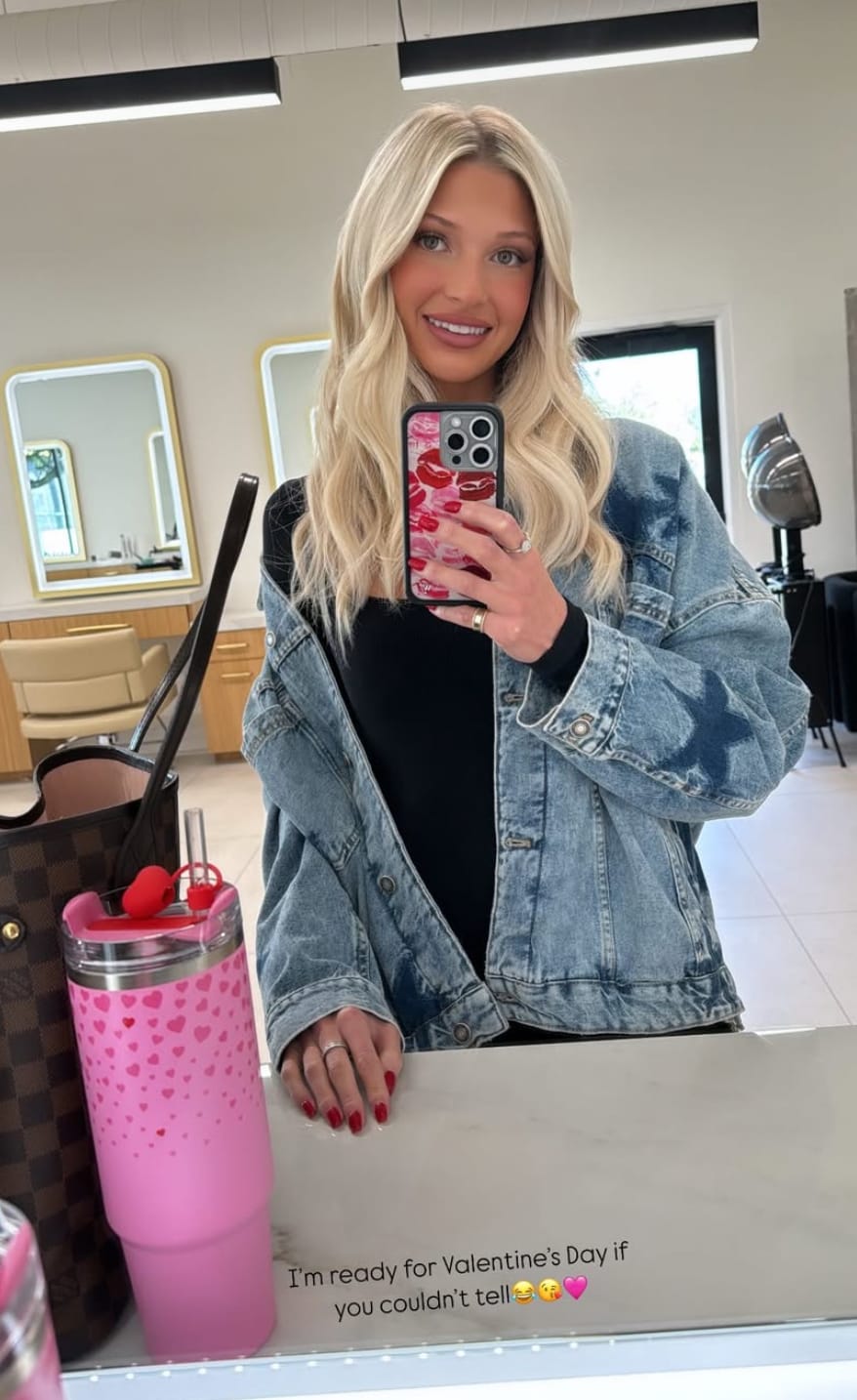 Dallas Cowboys cheerleader Sophy Laufer dazzles in denim blue stars coat