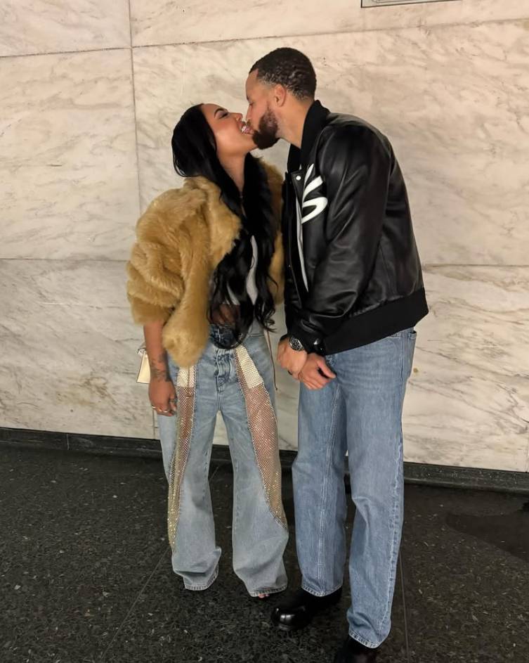 Steph Curry, wife Ayesha have over-the-top kiss as she rocks sheer ...